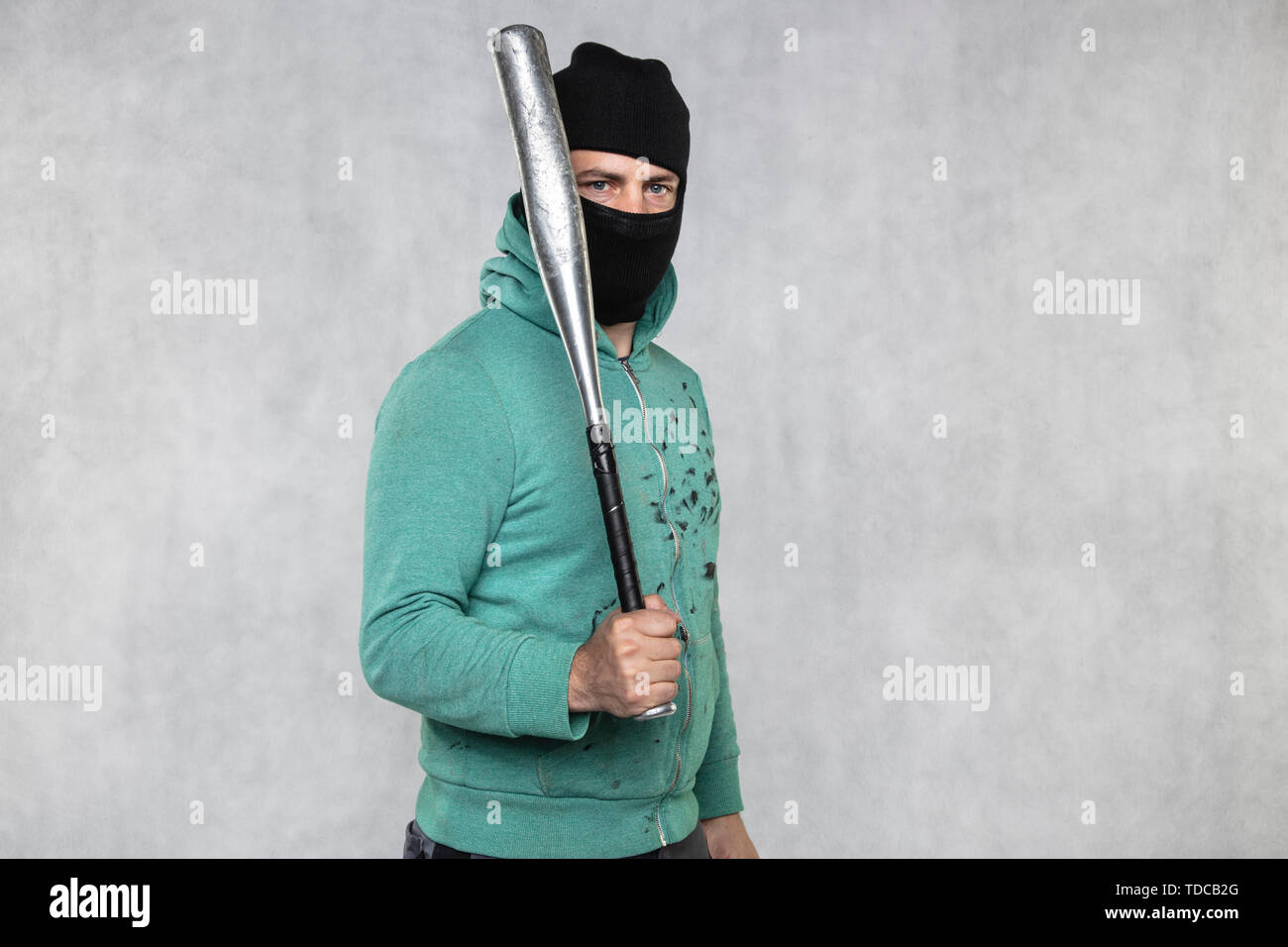 Balaclava man baseball bat hi-res stock photography and images - Alamy