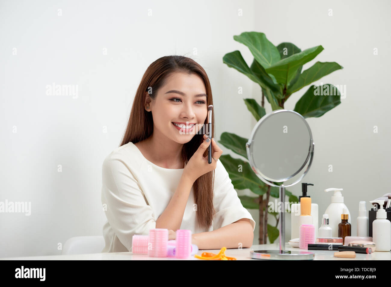 Close up of beautiful face of asian young woman getting make-up. Asian ...