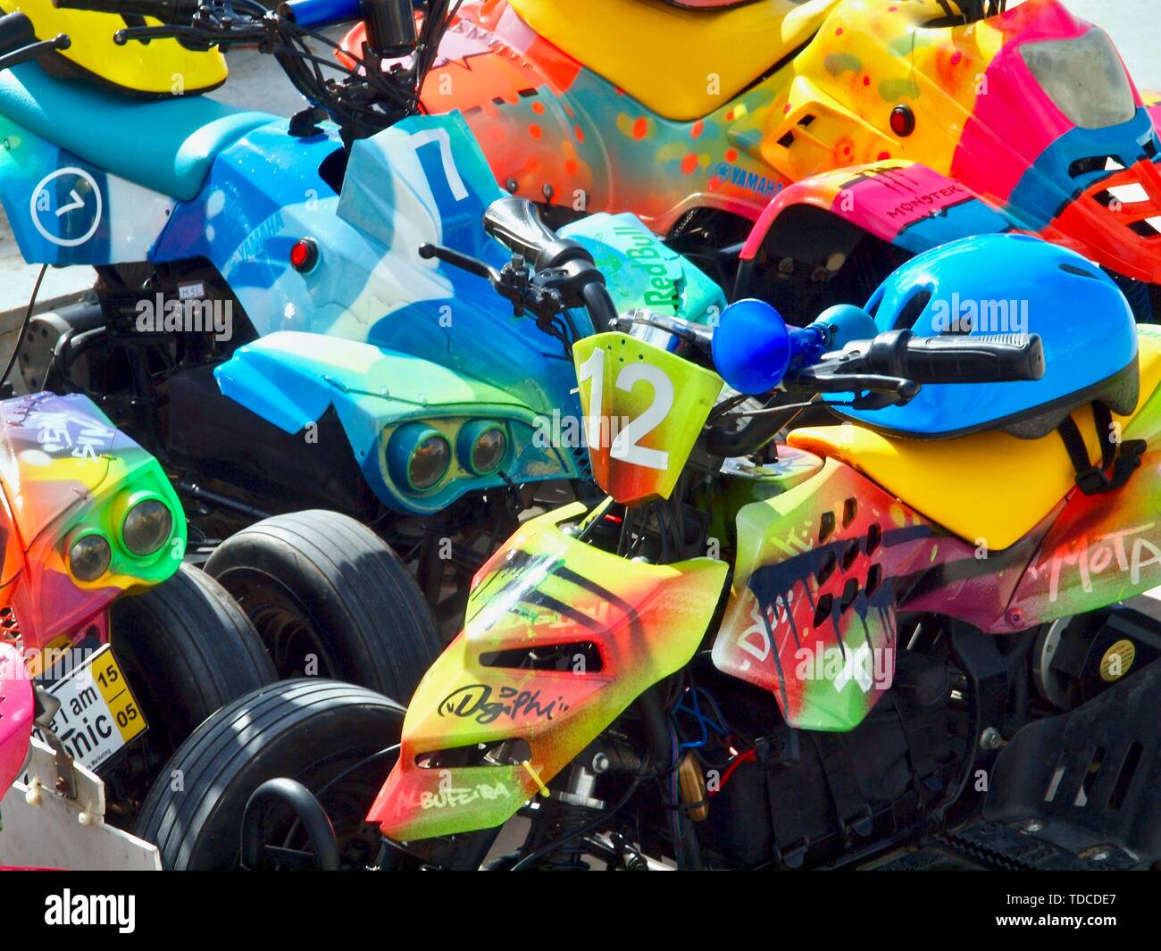 Colorful motor buggies with helmets outside Stock Photo - Alamy