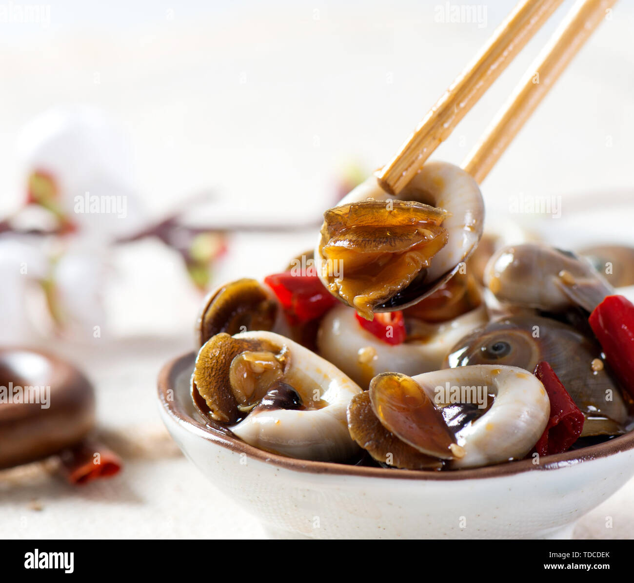 Spicy seafood snail Stock Photo - Alamy