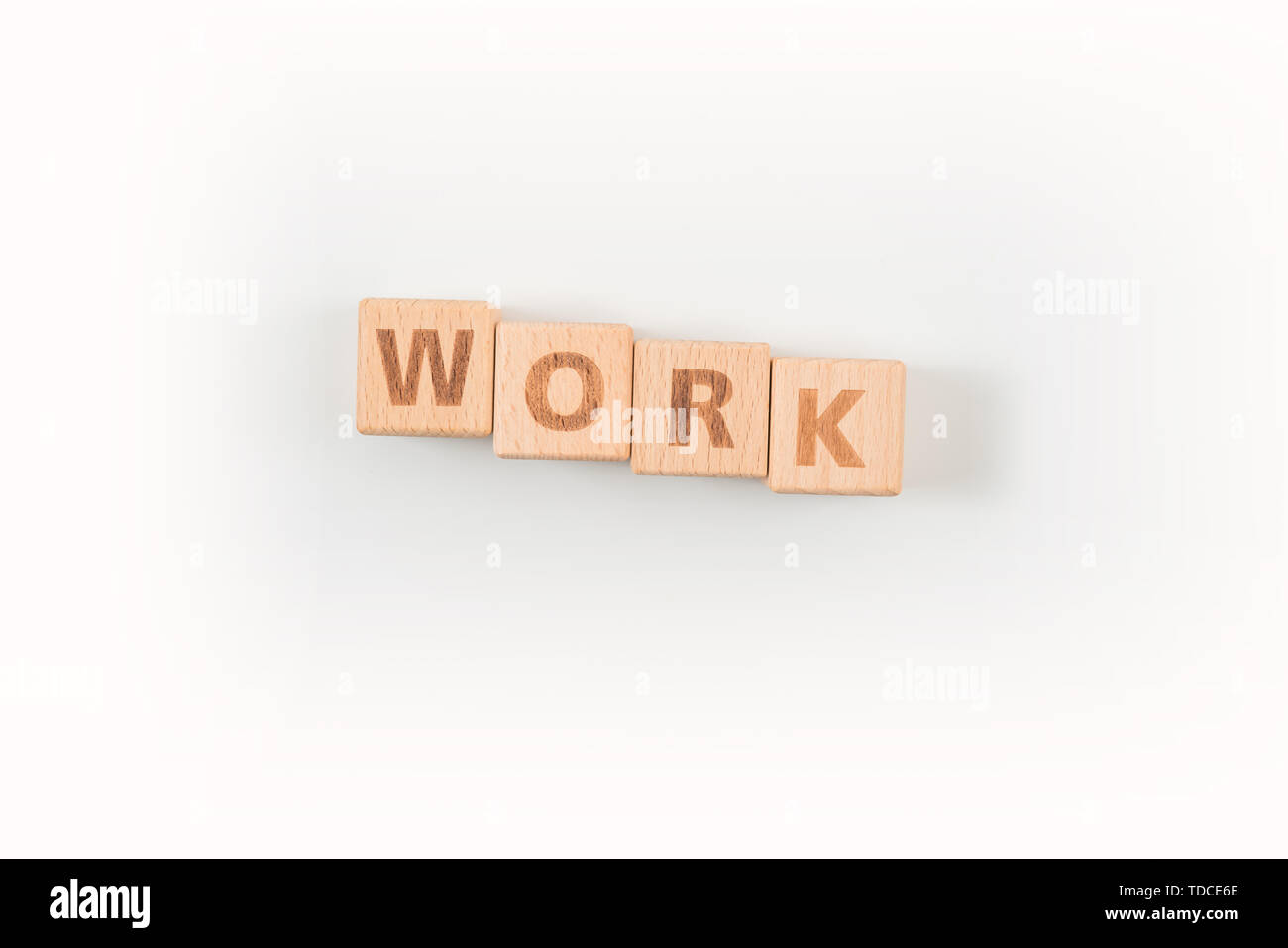 Work wooden blocks of business concept isolated on white background ...