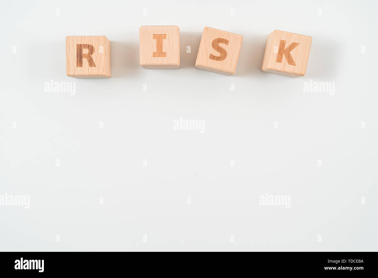 RISK wooden blocks of business concept isolated on white background ...