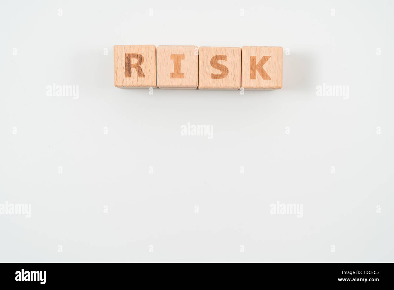 RISK wooden blocks of business concept isolated on white background ...