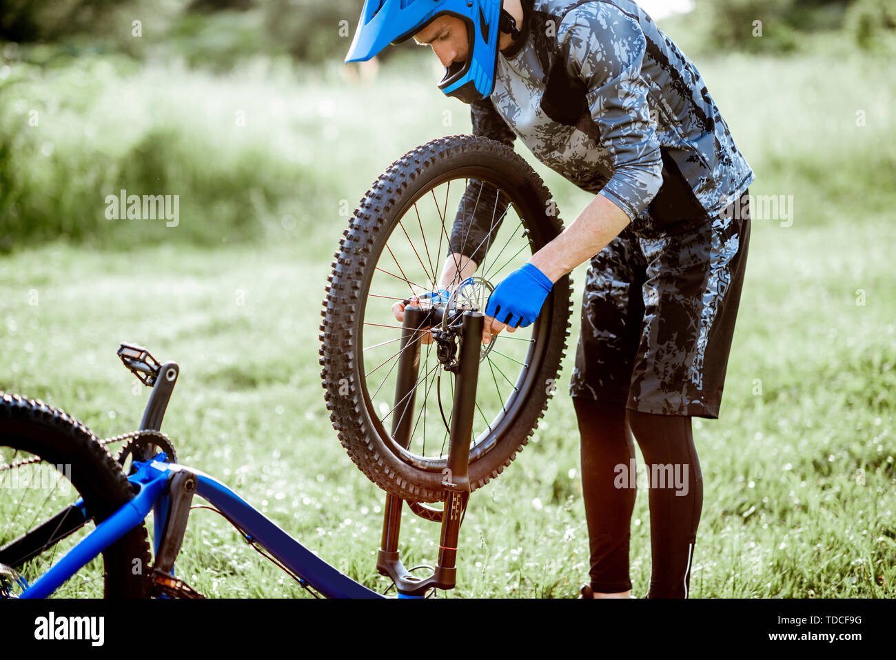 Professional cyclist taking bicycle hi-res stock photography and images ...