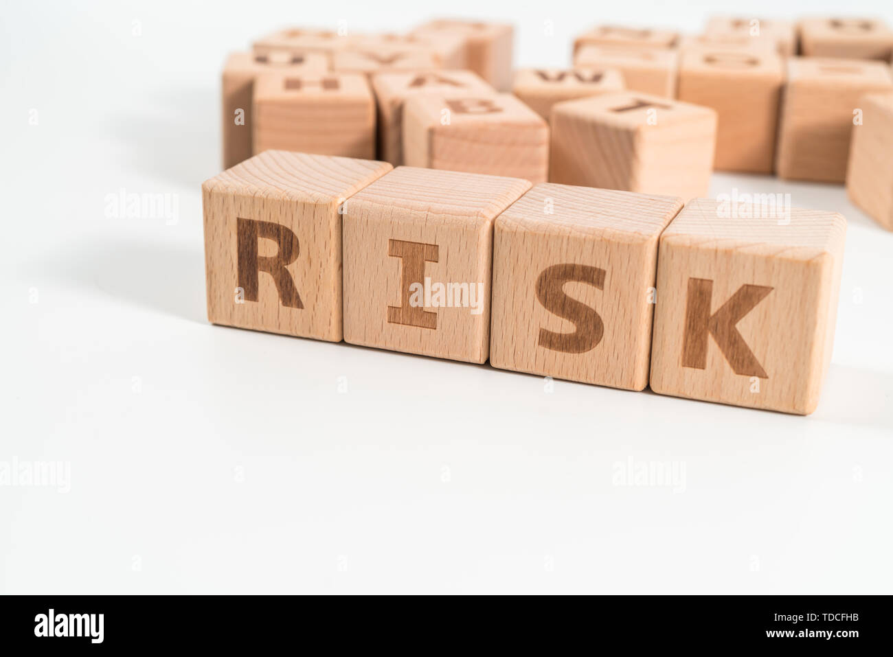 RISK wooden blocks of business concept isolated on white background ...