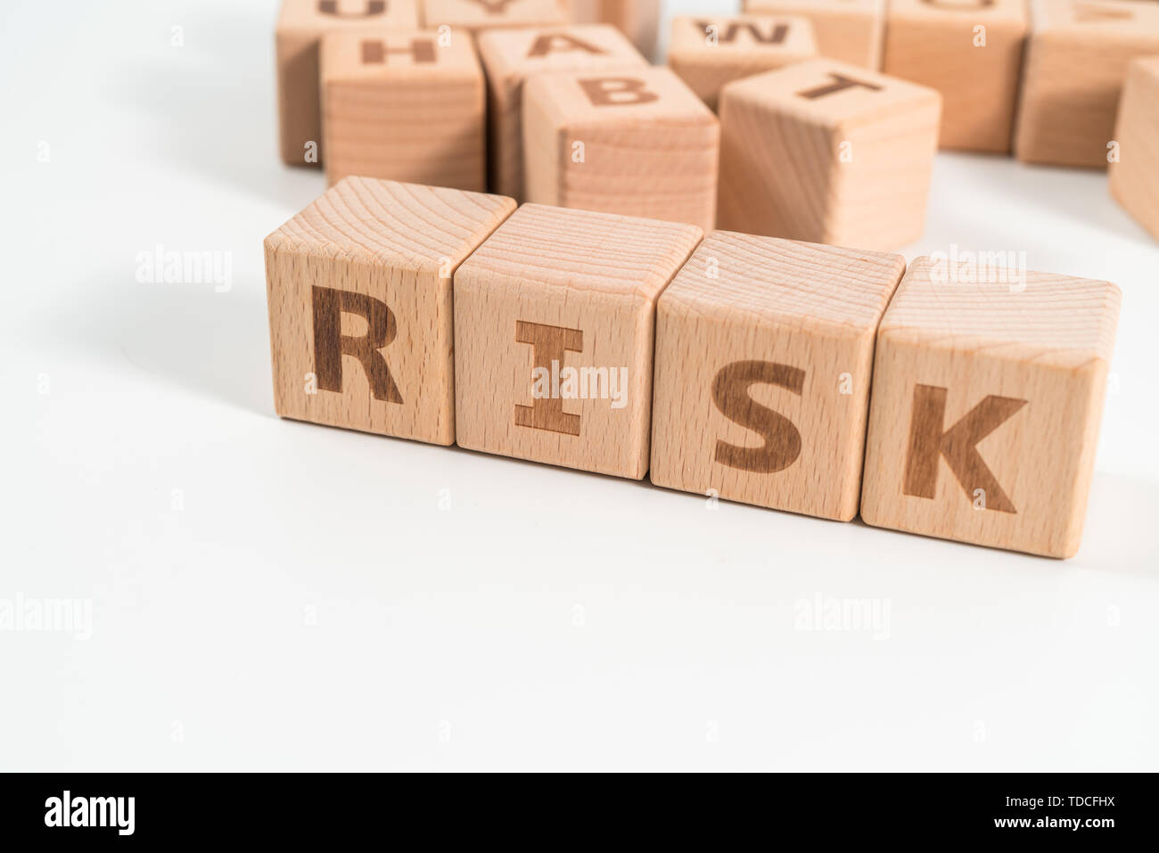 RISK wooden blocks of business concept isolated on white background ...