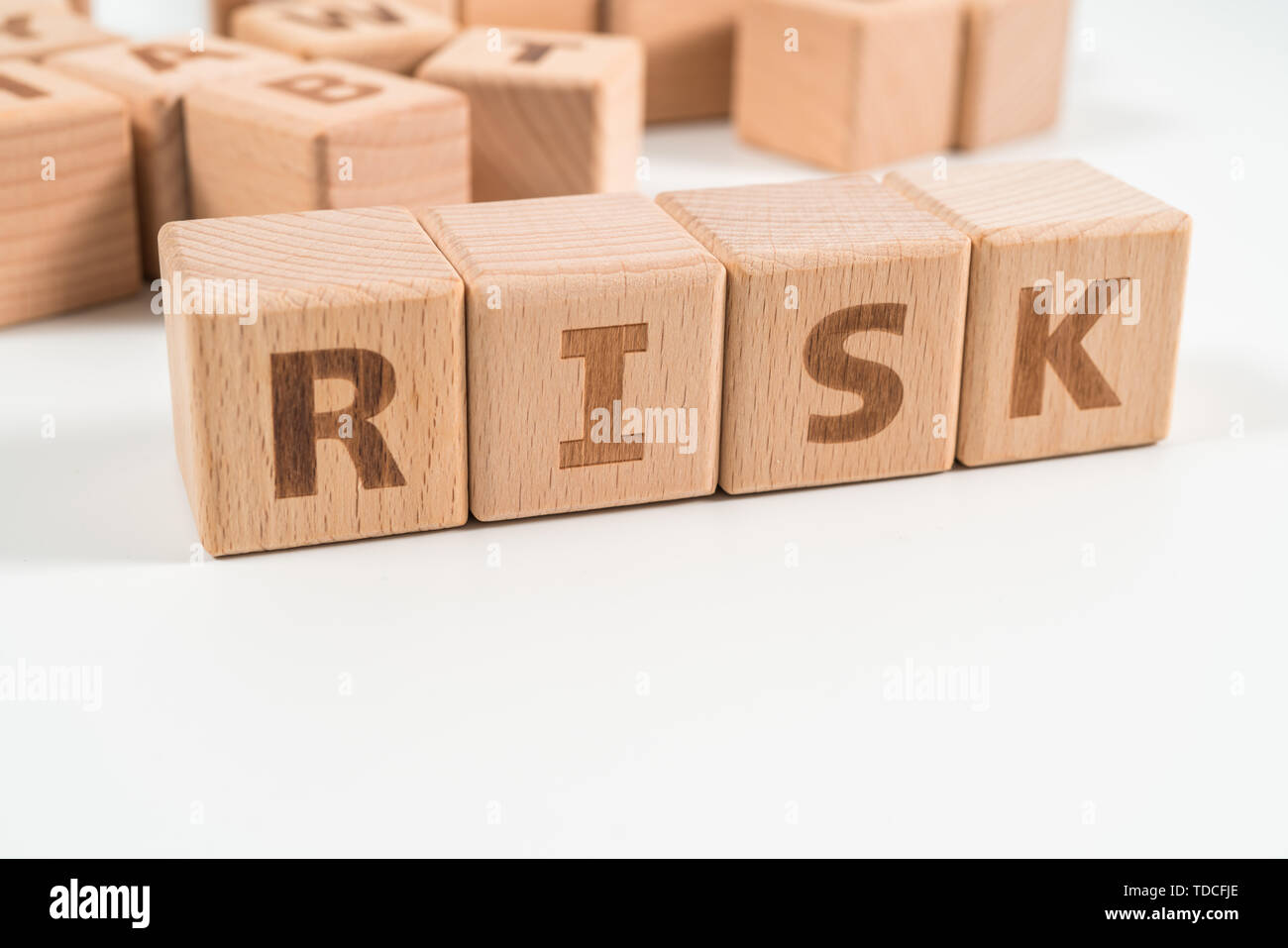 RISK wooden blocks of business concept isolated on white background ...