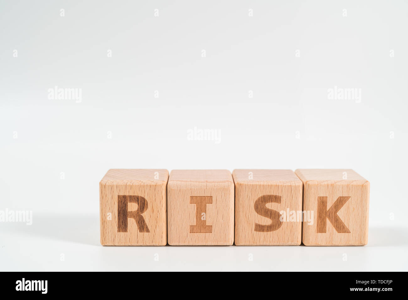 RISK wooden blocks of business concept isolated on white background ...