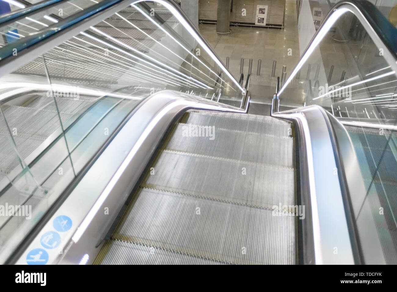 Modern escalator electronic system moving Stock Photo - Alamy