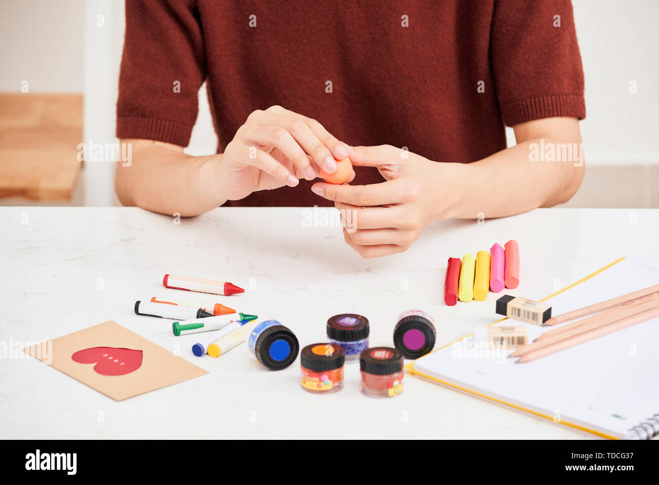 Female hands working with polymer clay. The process of working with the ...