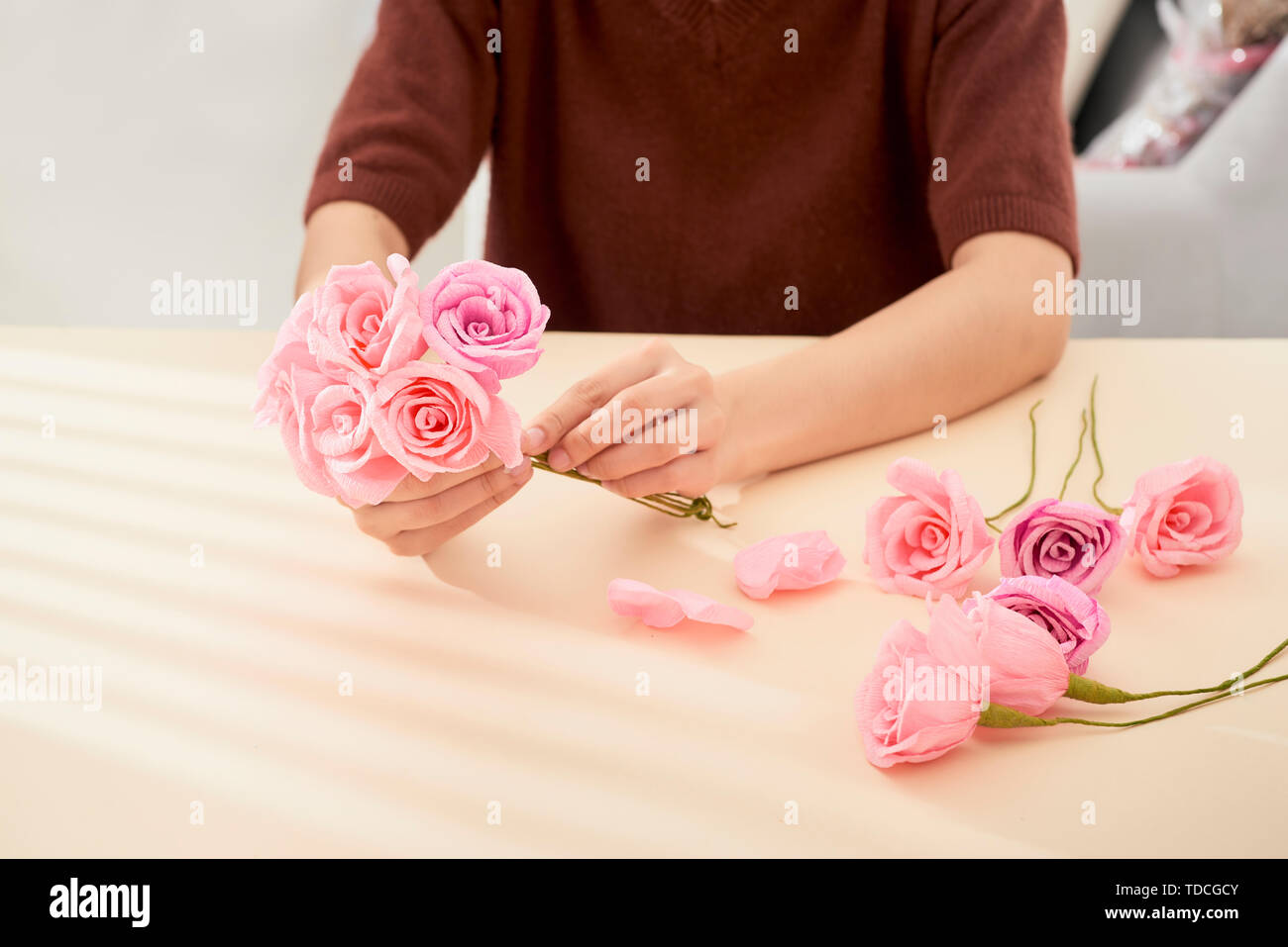 People making paper craft flower art Stock Photo - Alamy