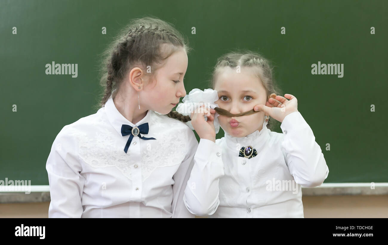 Teenage girls school are dabbling and joking with each other Stock ...
