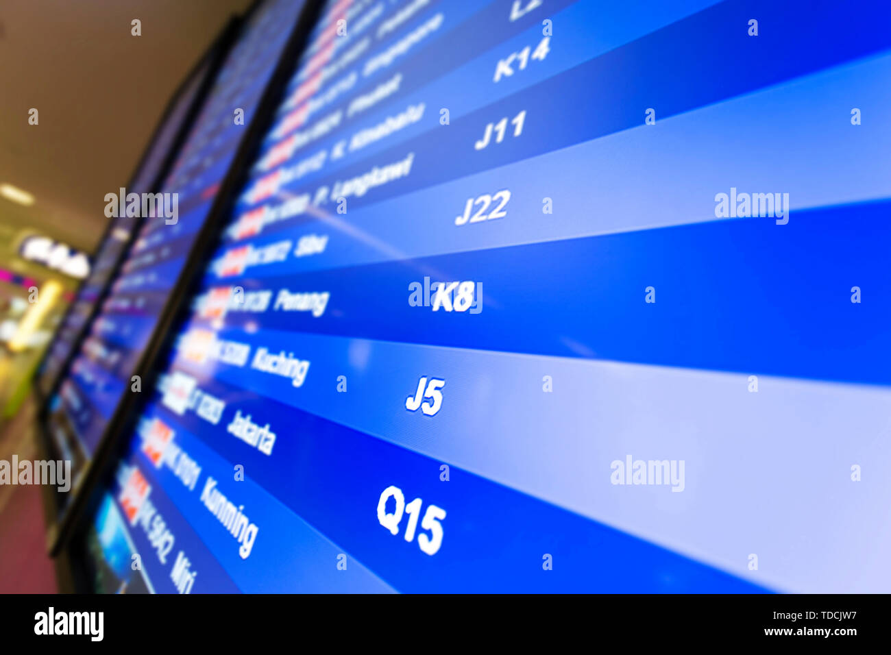 Flight display screen board in airport Stock Photo - Alamy
