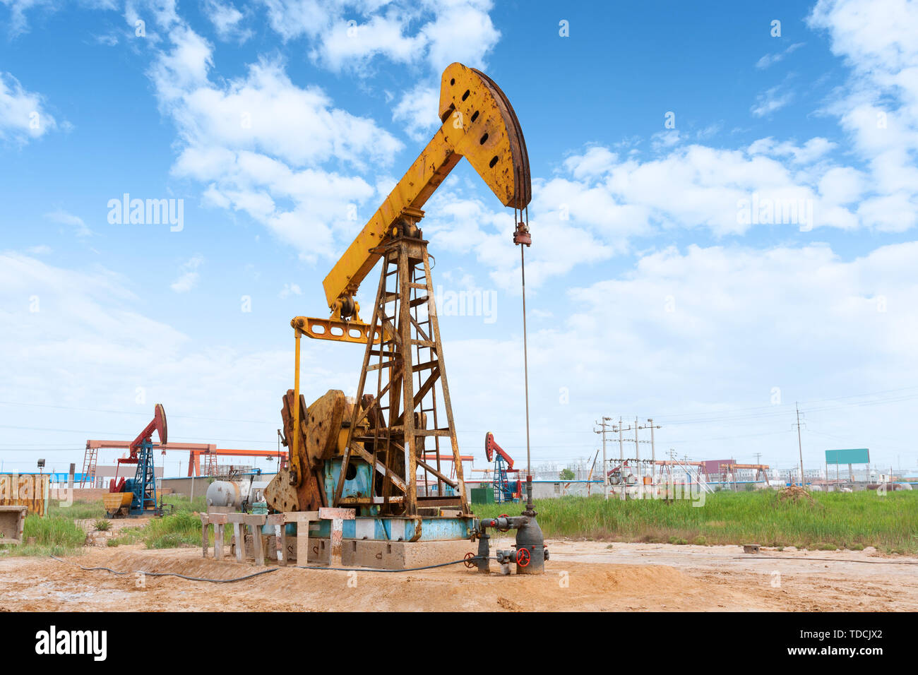Oil well and bluesky Stock Photo - Alamy