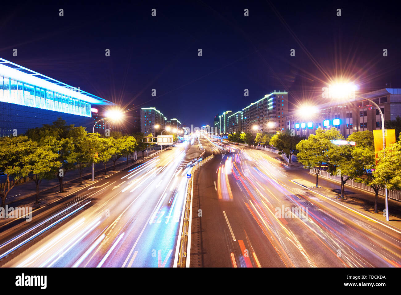 traffic on road in midtown of modern city Stock Photo - Alamy