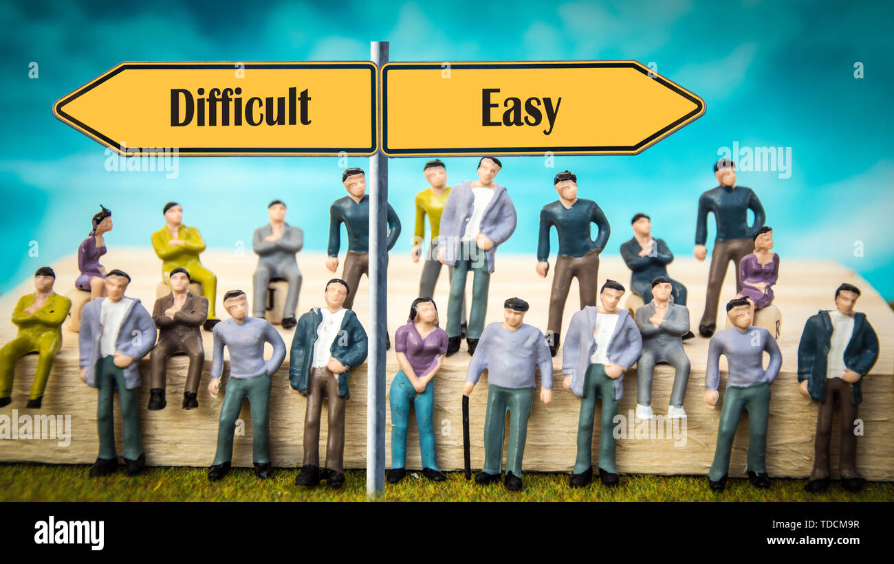 Street Sign the Direction Way to Easy versus Difficult Stock Photo - Alamy
