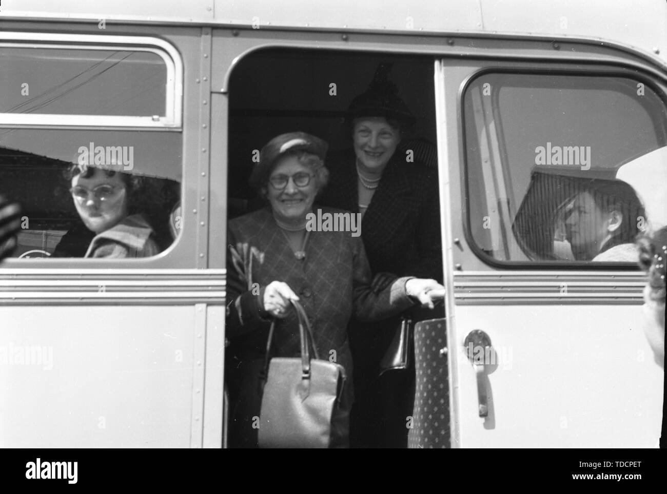 Elderly lady on a bus Black and White Stock Photos & Images - Alamy