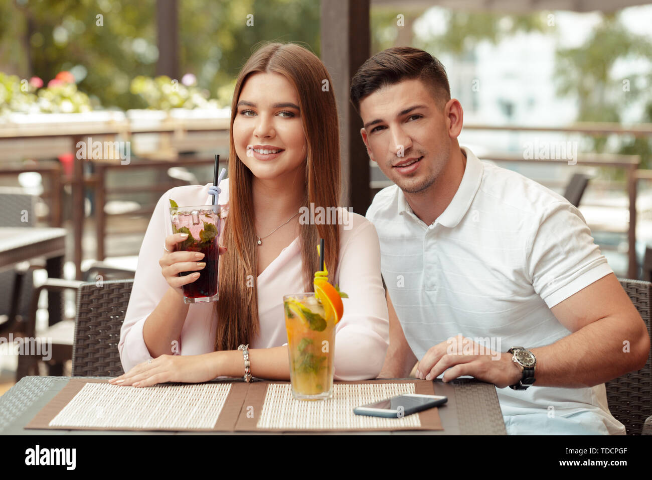 Two people in cafe enjoying the time spending with each other Stock ...