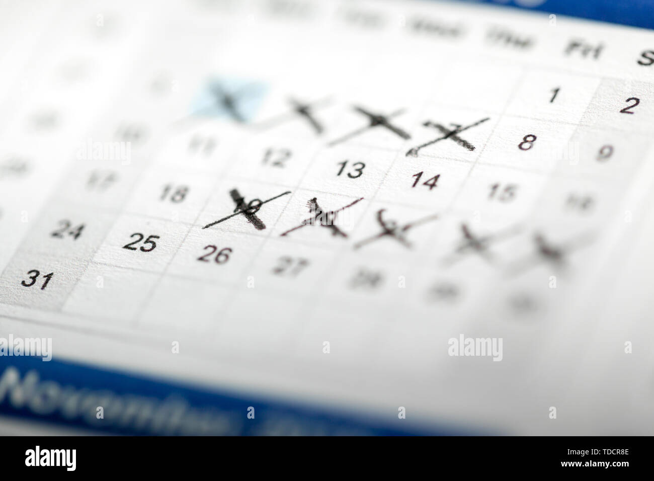 Closeup of dates on calendar page Stock Photo - Alamy