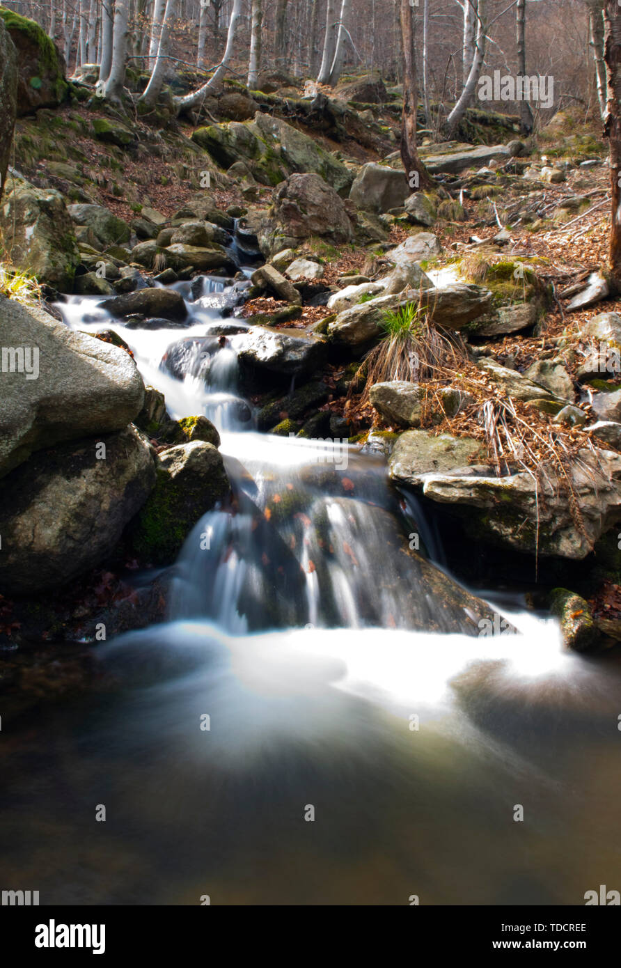 The water descends into the stream, forming small enchanted ponds Stock ...