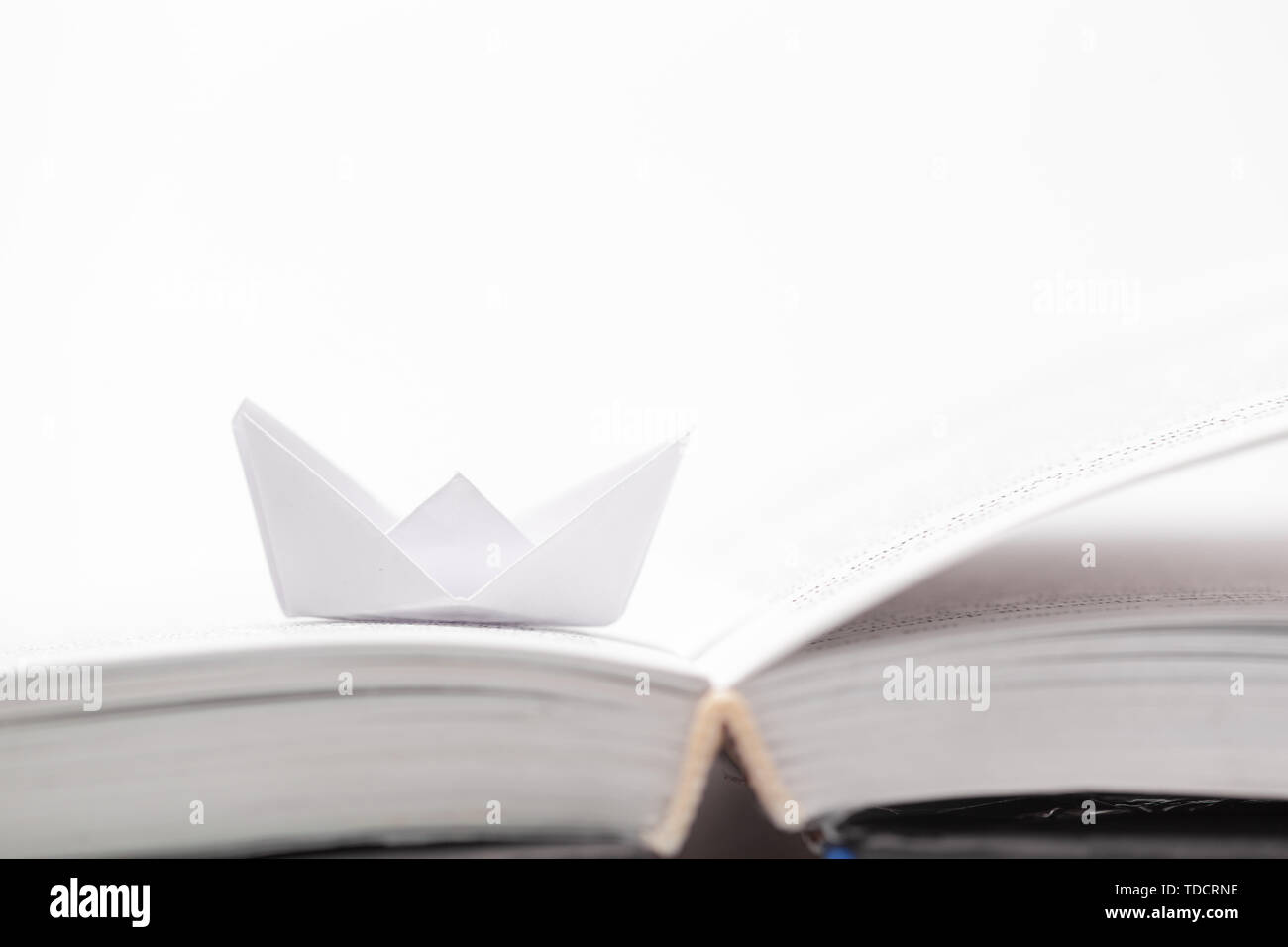 Origami boat, book hi-res stock photography and images - Alamy