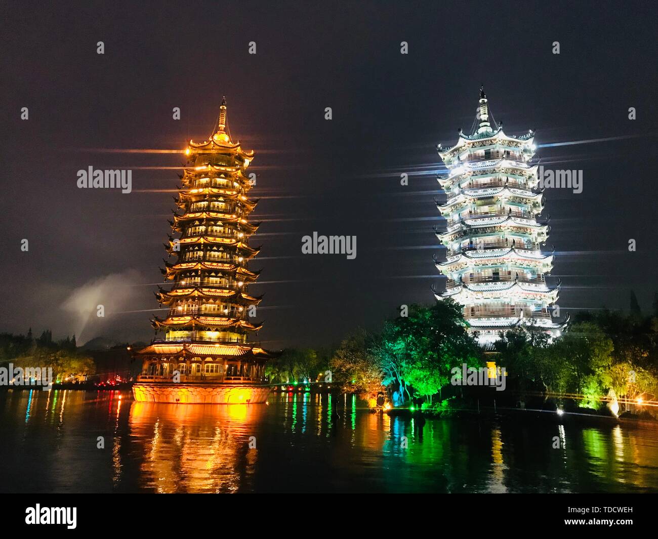 The sun and moon towers of Guilin, the lights are brilliant at night ...