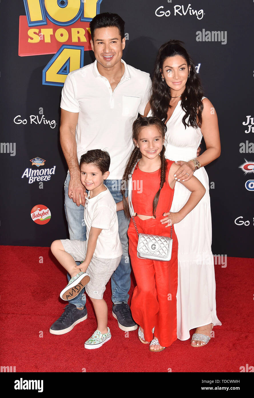HOLLYWOOD, CA - JUNE 11: Mario Lopez, Courtney Mazza, Dominic Lopez and ...