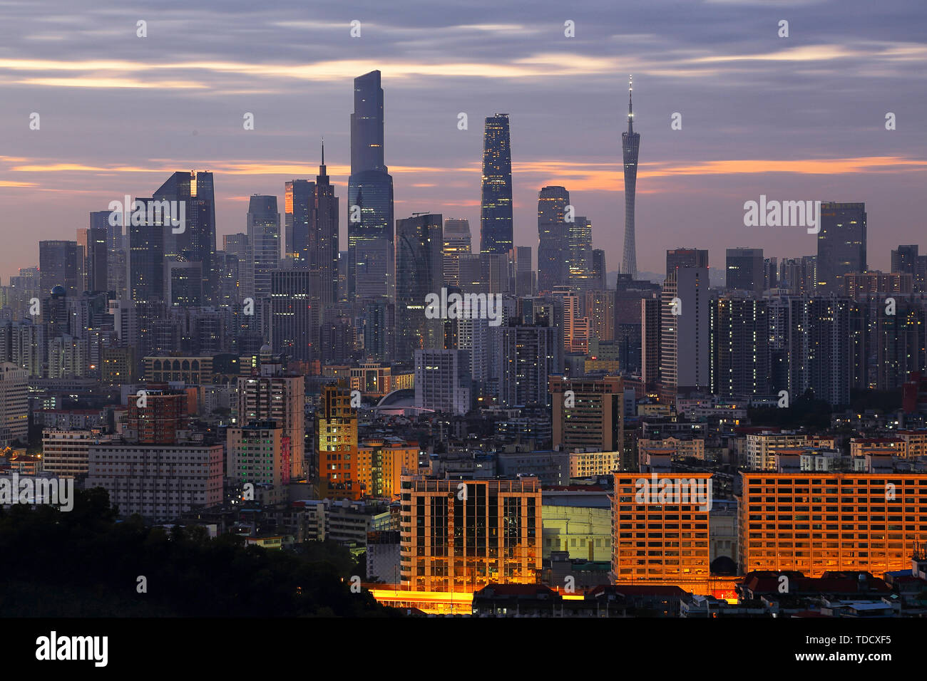 Guangzhou Baiyun Mountain overlooks the sky and sunrise city scenery ...