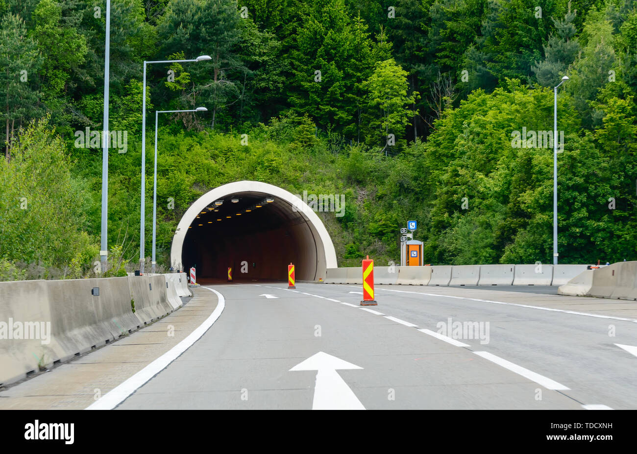 Highway road tunnel entrance in the mountains Stock Photo - Alamy