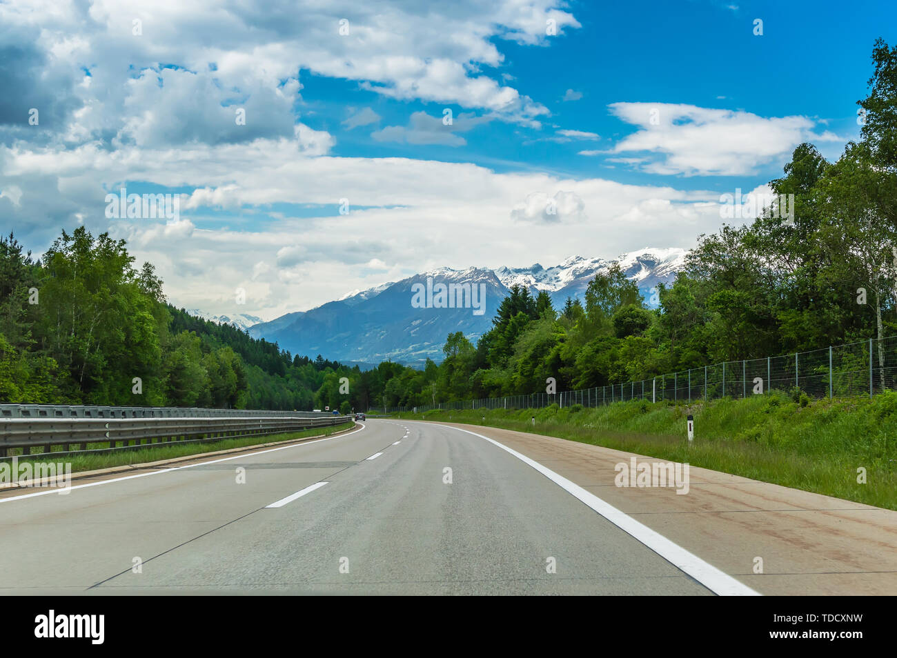 Autobahn or highway in the mountains Stock Photo - Alamy