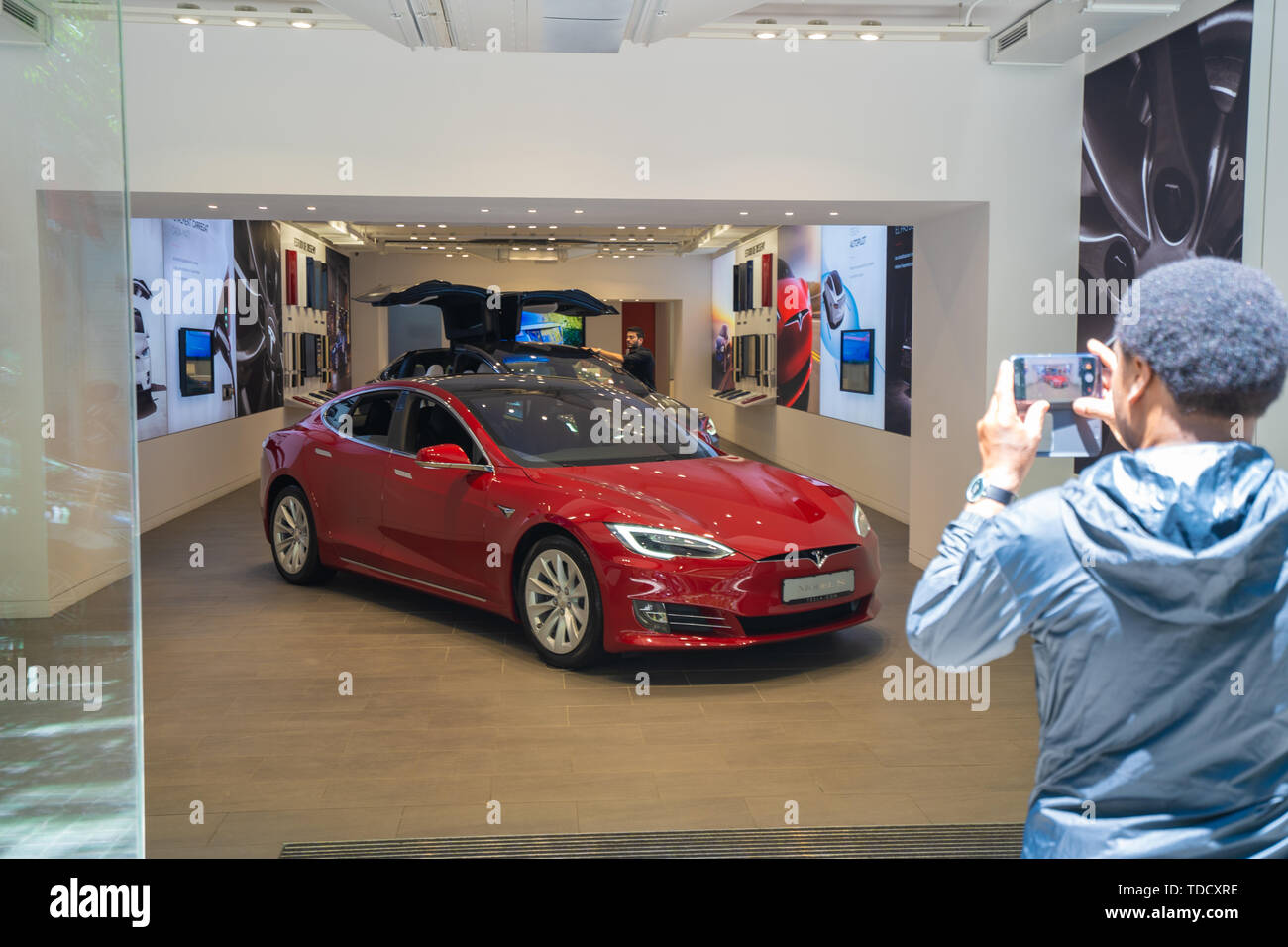 Barcelona, Spain. June 2019: Pedestrian taking a picture with the ...