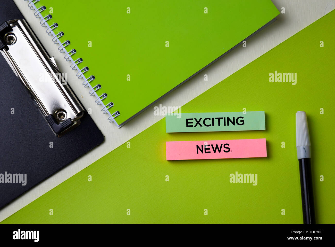 Exciting News text on top view office desk table of Business workplace ...