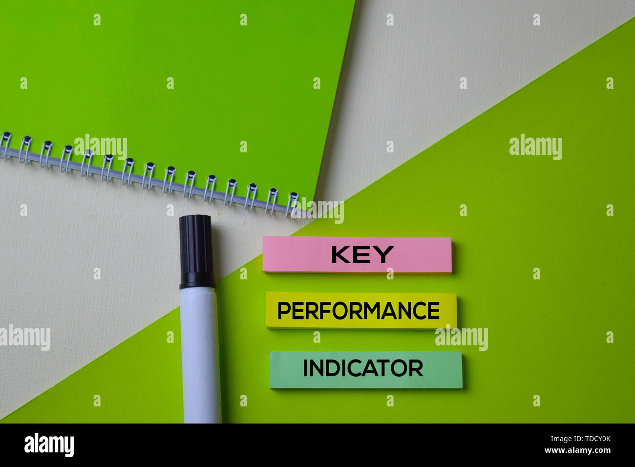 Key Performance Indicator (KPI) text on top view office desk table of ...
