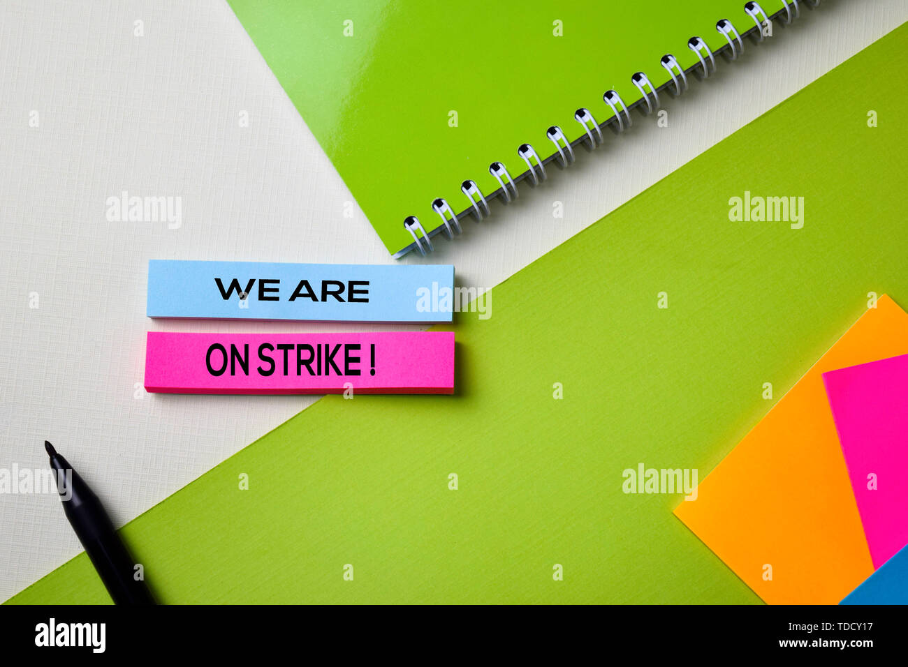 We Are on Strike! text on top view office desk table of Business ...