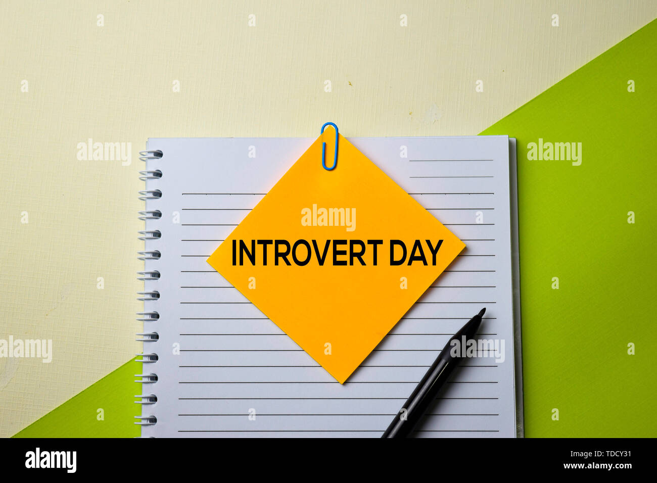 Introvert Day text on top view office desk table of Business workplace ...