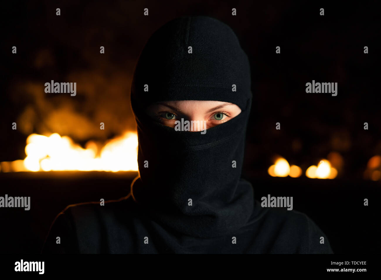 Female thief in black mask hi-res stock photography and images - Alamy