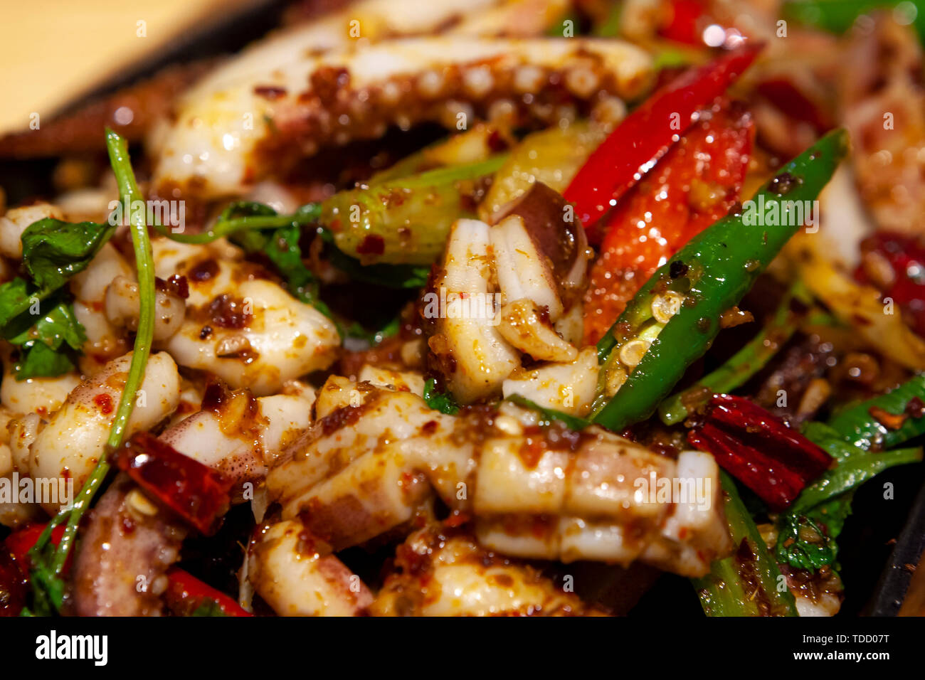 Iron squid cuisine Stock Photo - Alamy