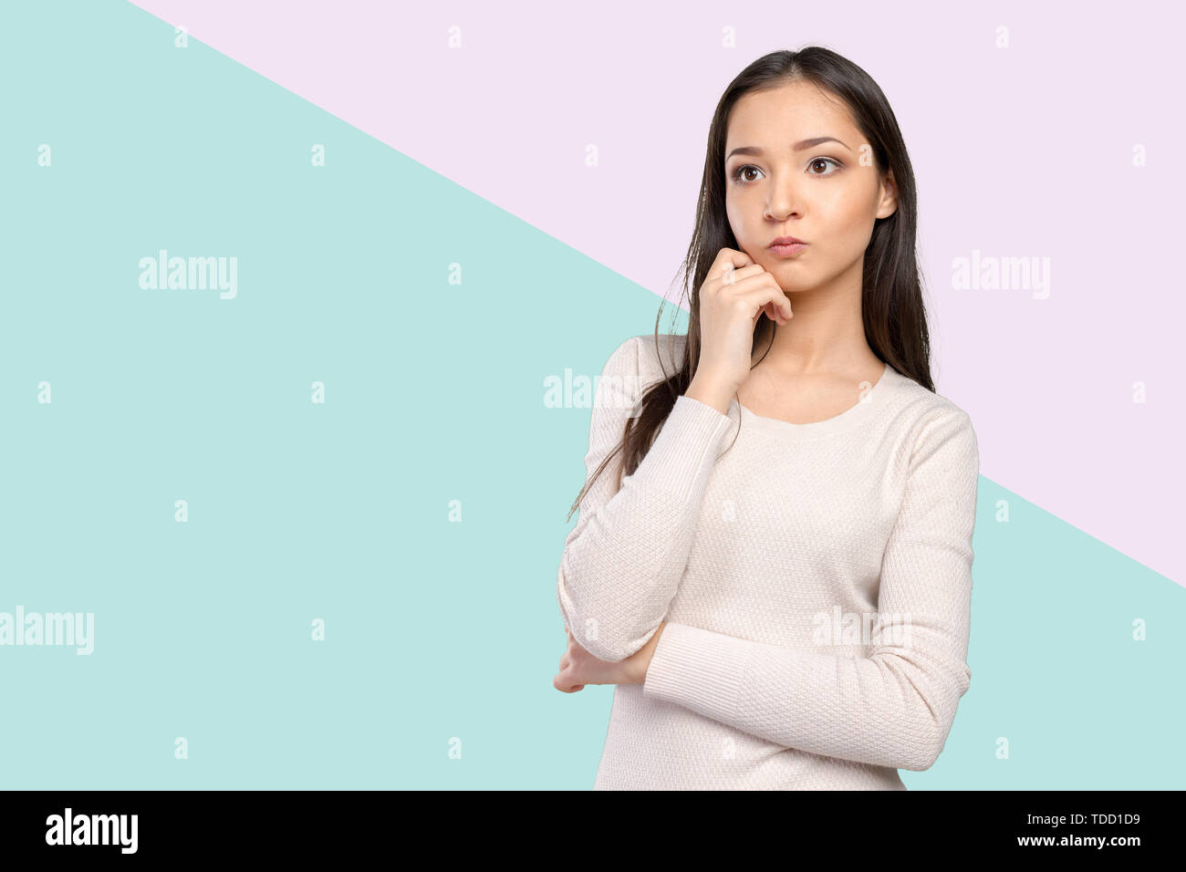 Asian woman thinking Stock Photo - Alamy