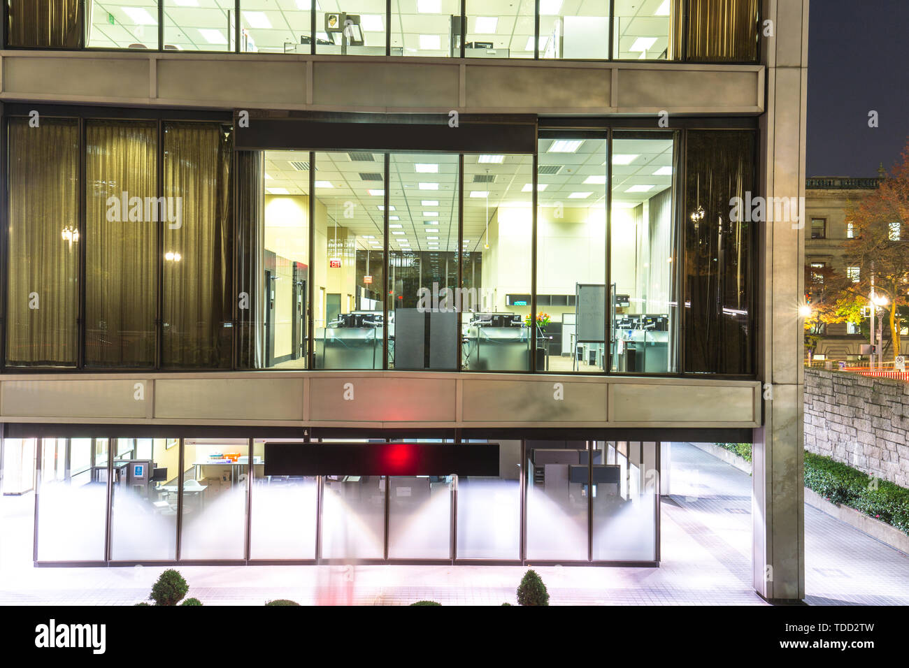 Modern office building at night Stock Photo - Alamy