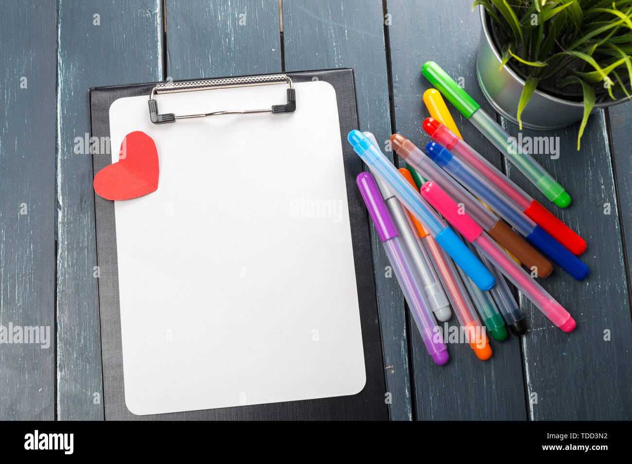 clean sheets on table with markers Stock Photo - Alamy