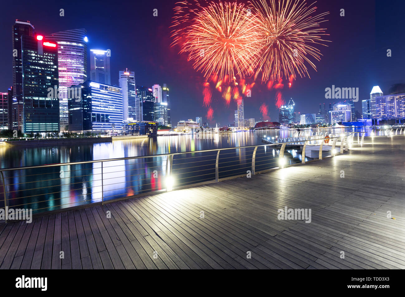 firework and night view of prosperous city Stock Photo - Alamy