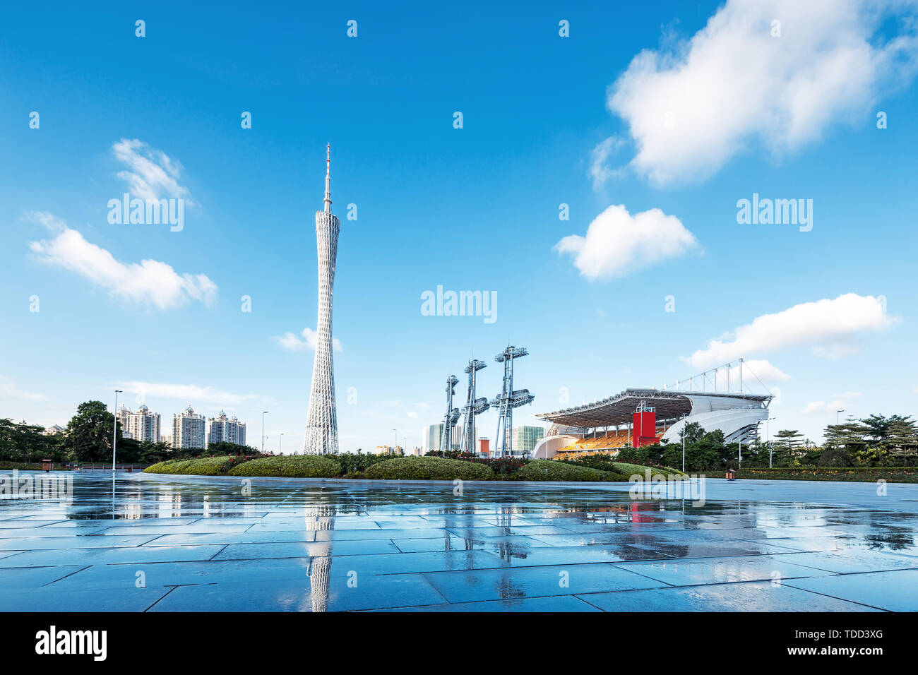 modern square and skyscrapers under blue sky Stock Photo - Alamy