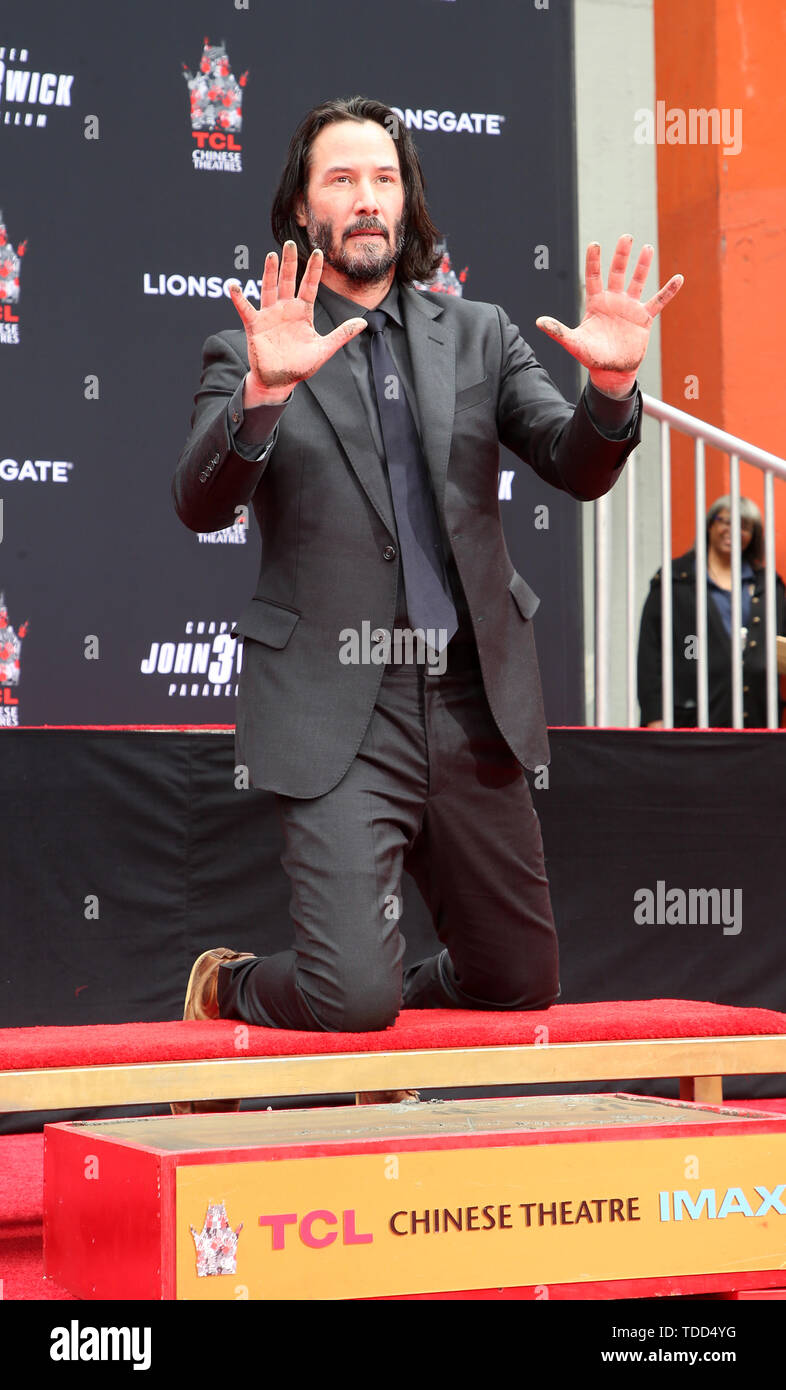 Keanu Reeves Places His Hand Prints In Cement Featuring: Keanu Reeves ...