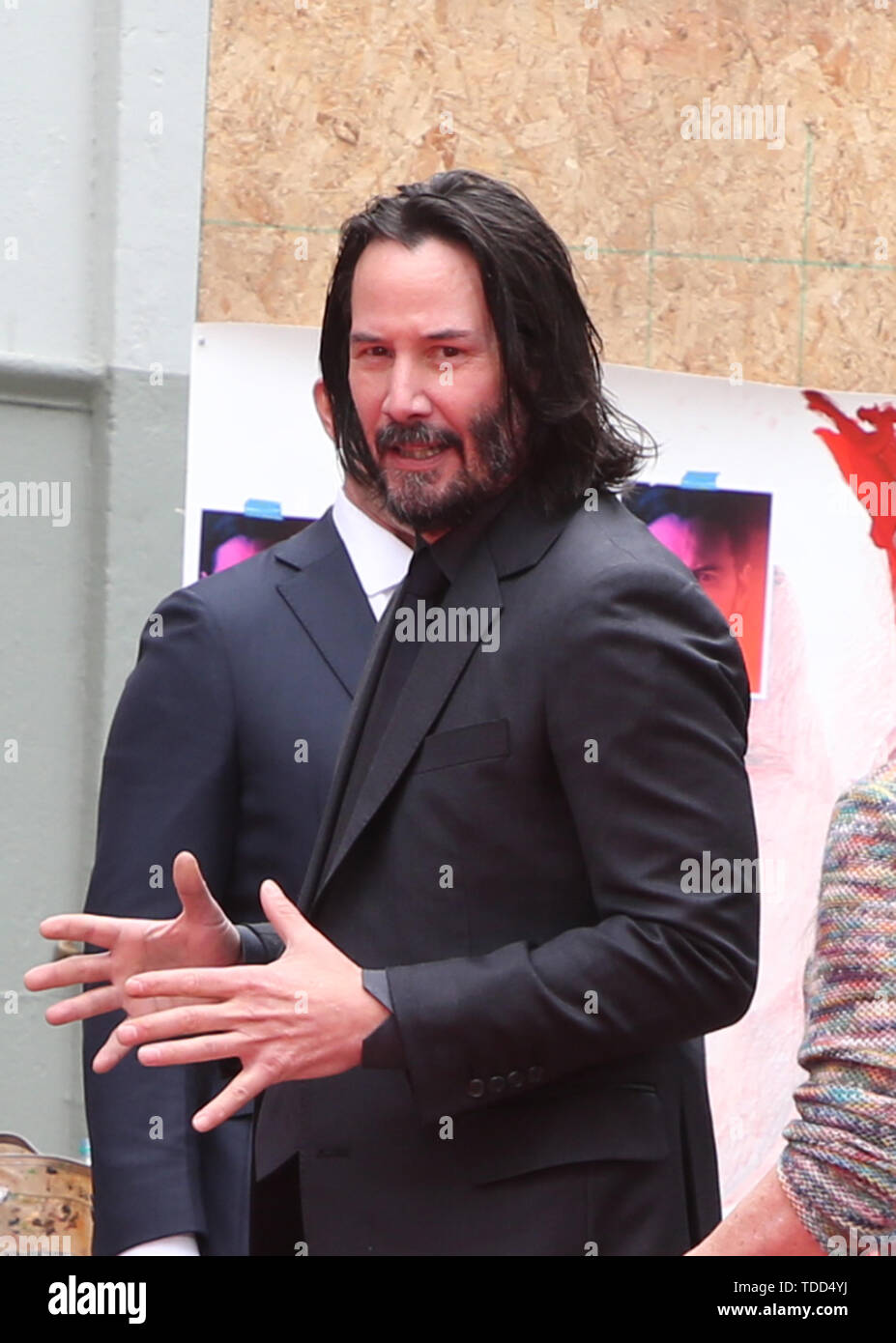 Keanu Reeves Places His Hand Prints In Cement Featuring: Keanu Reeves ...