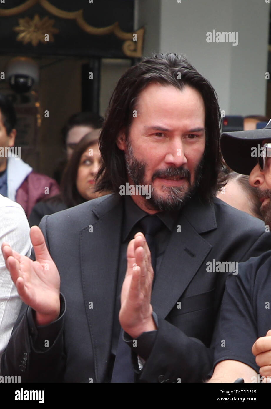 Keanu Reeves Places His Hand Prints In Cement Featuring: Keanu Reeves ...