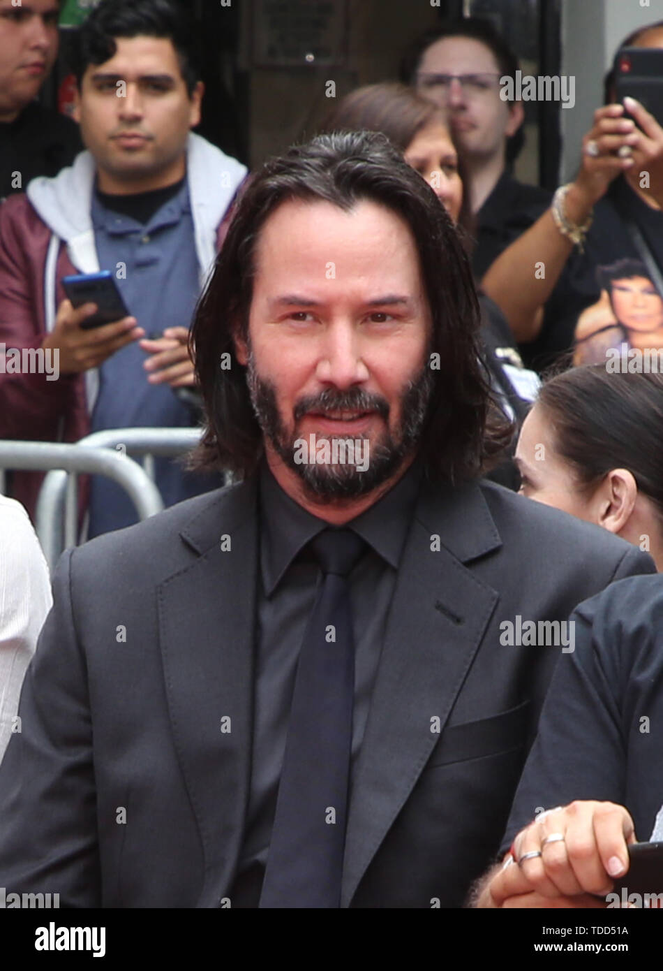 Keanu Reeves Places His Hand Prints In Cement Featuring: Keanu Reeves ...