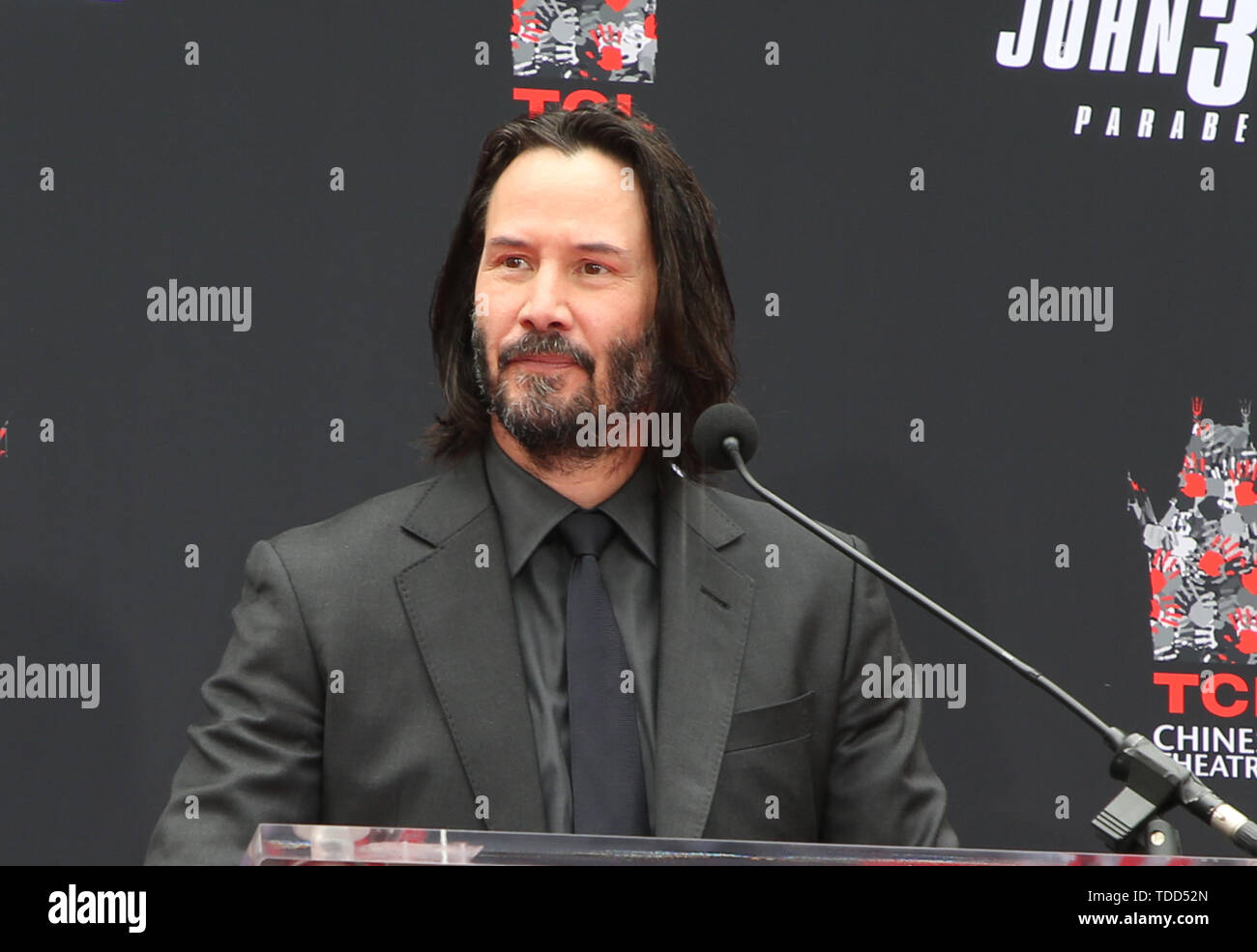 Keanu Reeves Places His Hand Prints In Cement Featuring: Keanu Reeves ...