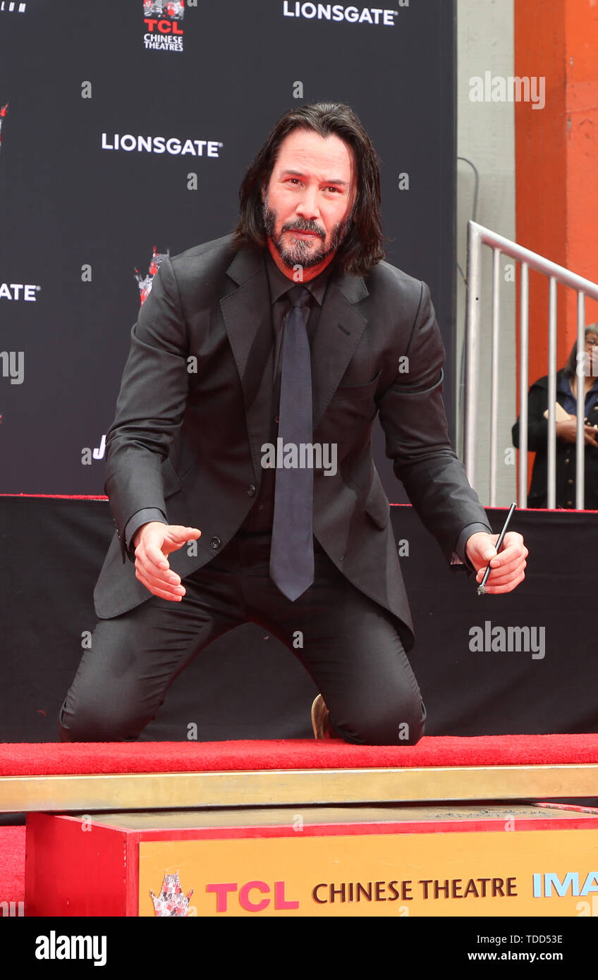 Keanu Reeves Places His Hand Prints In Cement Featuring: Keanu Reeves ...