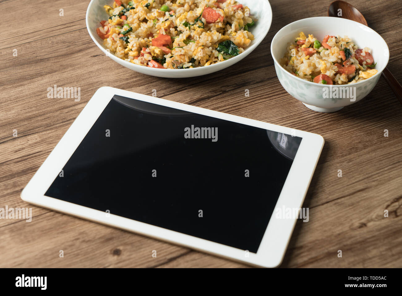 Egg fried rice with computer screen Stock Photo - Alamy