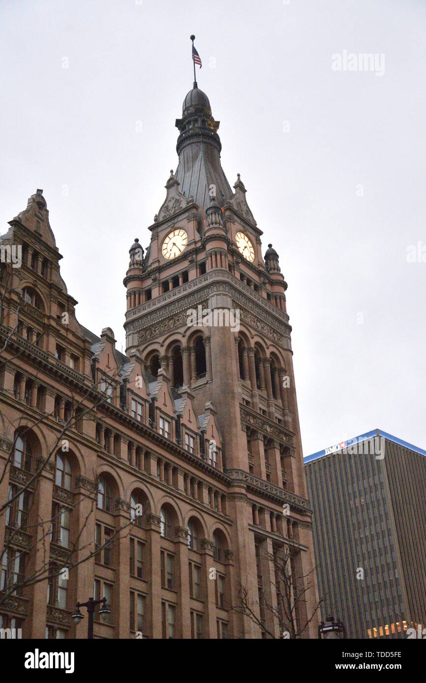 The clock tower of an ancient American building Stock Photo - Alamy